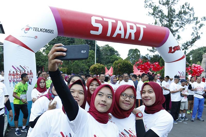 Telkomsel rangkul pasar muda dengan I LOOP RUN 5K